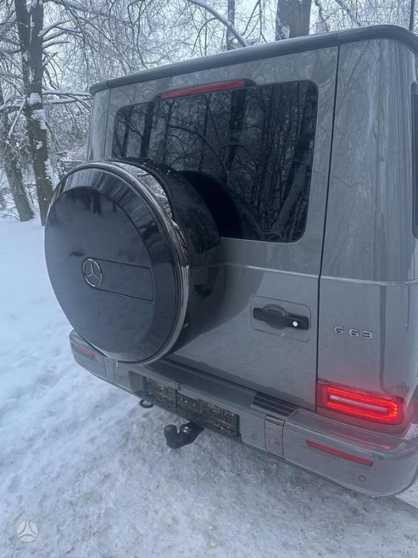 Grey Mercedes-Benz G63 AMG 2025 in Kaunas, with an engine capacity of 3.98 L and mileage of 19 thousand km for 242000 €, photo 7 on AUTOMOTO.COM.LV