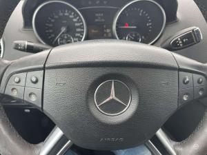Black Mercedes-Benz GL 320 2006 in Kaunas, with an engine capacity of 2.99 L and mileage of 280 thousand km for 7250 €, photo 13 on AUTOMOTO.COM.LV