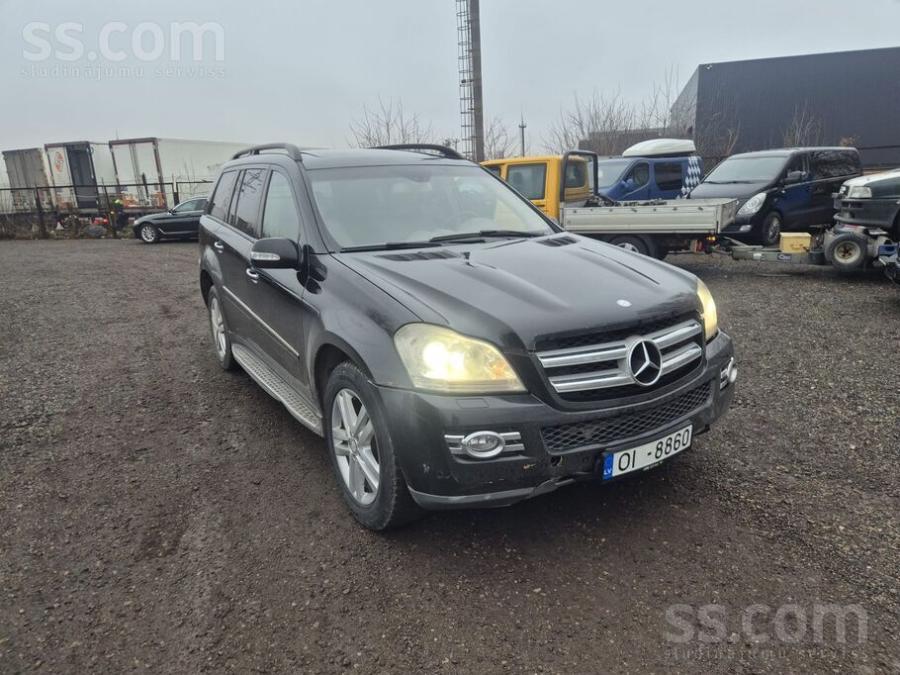 Black Mercedes-Benz GL 320 2007 in Riga, with an engine capacity of 3.00 L and mileage of 320 thousand km for 3690 €, photo 2 on AUTOMOTO.COM.LV