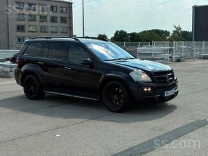 Black Mercedes-Benz GL 320 2007 in Riga, with an engine capacity of 3.00 L and mileage of 345 thousand km for 11980 €, photo 4 on AUTOMOTO.COM.LV