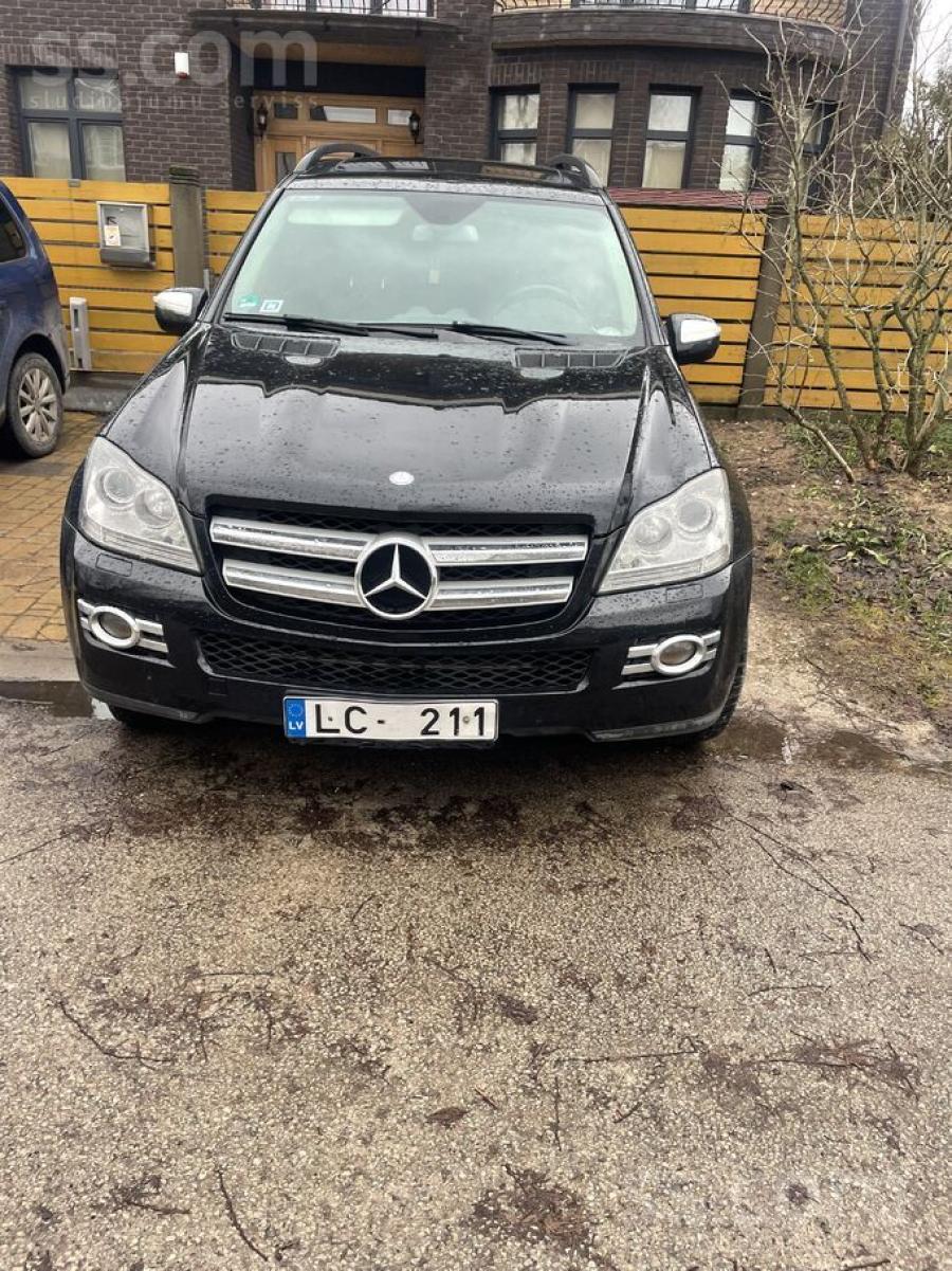 Black Mercedes-Benz GL 320 2009 in Riga, with an engine capacity of 3.00 L and mileage of 282 thousand km for 9050 €, photo 1 on AUTOMOTO.COM.LV