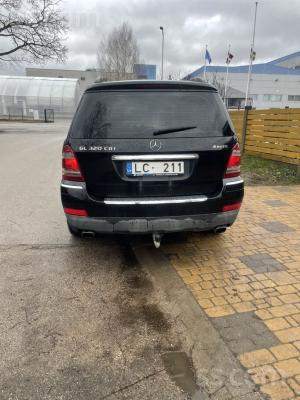 Black Mercedes-Benz GL 320 2009 in Riga, with an engine capacity of 3.00 L and mileage of 282 thousand km for 9050 €, photo 7 on AUTOMOTO.COM.LV