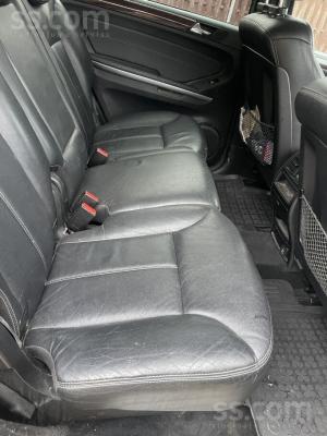 Black Mercedes-Benz GL 320 2009 in Riga, with an engine capacity of 3.00 L and mileage of 282 thousand km for 9050 €, photo 8 on AUTOMOTO.COM.LV