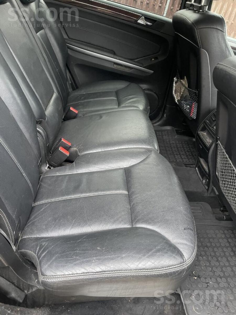 Black Mercedes-Benz GL 320 2009 in Riga, with an engine capacity of 3.00 L and mileage of 282 thousand km for 9050 €, photo 8 on AUTOMOTO.COM.LV