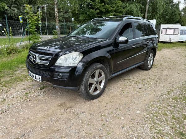 Black Mercedes-Benz GL 320 2009 in Ogre, with an engine capacity of 3.00 L and mileage of 188 thousand km for 4000 €, photo 1 on AUTOMOTO.COM.LV