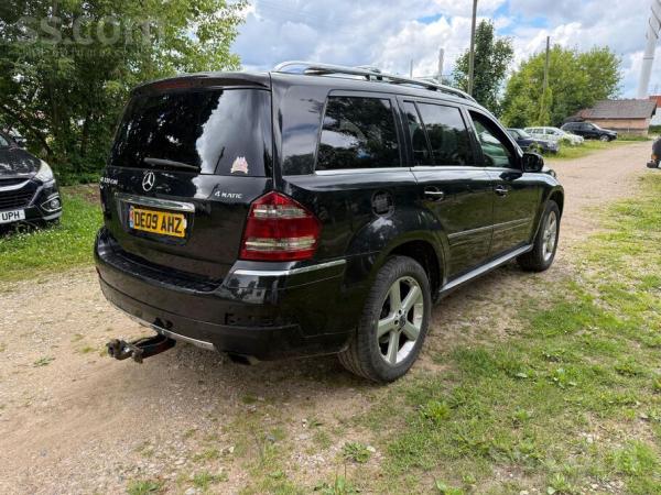 Black Mercedes-Benz GL 320 2009 in Ogre, with an engine capacity of 3.00 L and mileage of 188 thousand km for 4000 €, photo 4 on AUTOMOTO.COM.LV