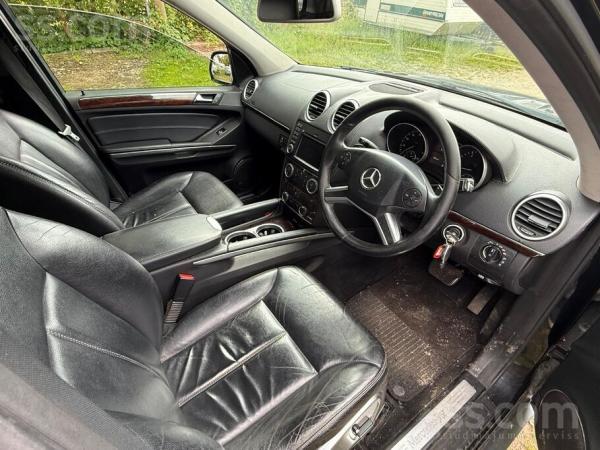 Black Mercedes-Benz GL 320 2009 in Ogre, with an engine capacity of 3.00 L and mileage of 188 thousand km for 4000 €, photo 6 on AUTOMOTO.COM.LV