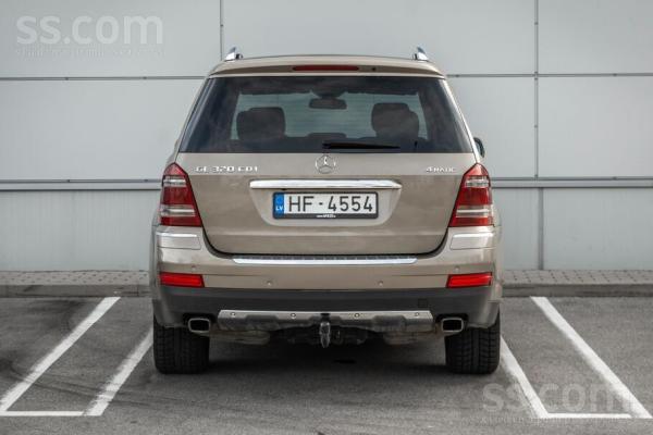 Brown Mercedes-Benz GL 320 2008 in Riga, with an engine capacity of 3.00 L and mileage of 327 thousand km for 5990 €, photo 5 on AUTOMOTO.COM.LV