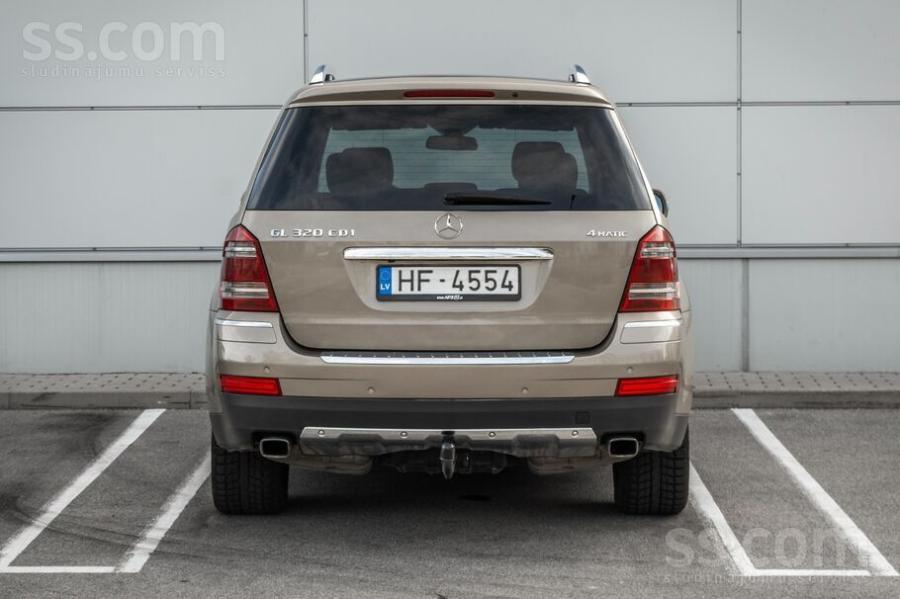 Brown Mercedes-Benz GL 320 2008 in Riga, with an engine capacity of 3.00 L and mileage of 327 thousand km for 5990 €, photo 6 on AUTOMOTO.COM.LV