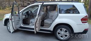 White Mercedes-Benz GL 320 2008 in Riga, with an engine capacity of 3.00 L and mileage of 267 thousand km for 8950 €, photo 23 on AUTOMOTO.COM.LV