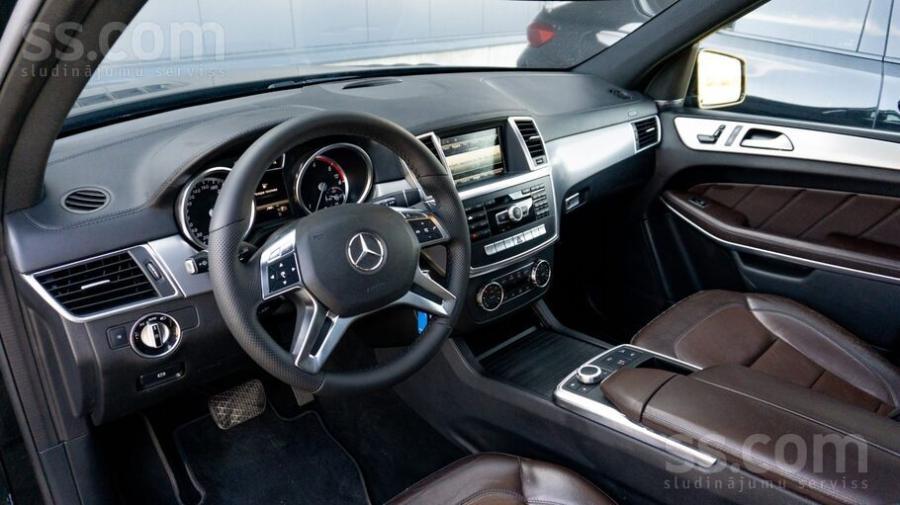 Black Mercedes-Benz GL 350 2013 in Riga, with an engine capacity of 3.00 L and mileage of 269 thousand km for 18990 €, photo 11 on AUTOMOTO.COM.LV