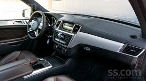 Black Mercedes-Benz GL 350 2013 in Riga, with an engine capacity of 3.00 L and mileage of 269 thousand km for 18990 €, photo 12 on AUTOMOTO.COM.LV