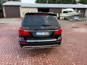 Black Mercedes-Benz GL 350 2013 in Klaipeda, with an engine capacity of 3.00 L and mileage of 241 thousand km for 18500 €, photo 7 on AUTOMOTO.COM.LV