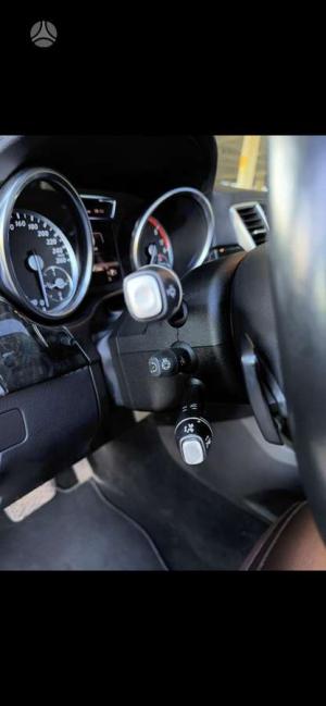 Black Mercedes-Benz GL 350 2014 in Vilnius, with an engine capacity of 2.99 L and mileage of 297 thousand km for 20200 €, photo 16 on AUTOMOTO.COM.LV