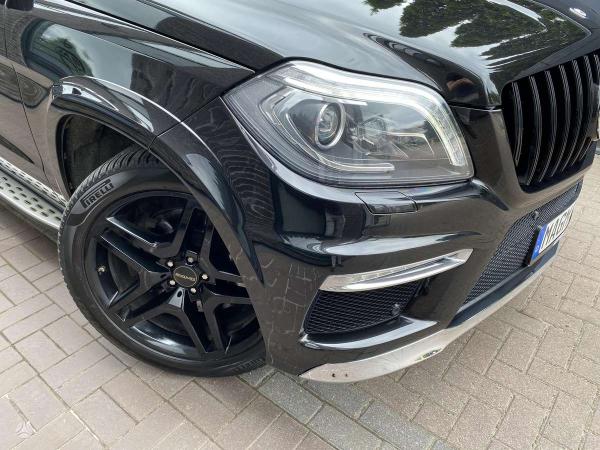 Black Mercedes-Benz GL 350 2014 in Marijampole, with an engine capacity of 2.99 L and mileage of 328 thousand km for 22450 €, photo 9 on AUTOMOTO.COM.LV