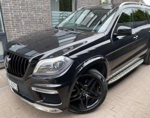 Black Mercedes-Benz GL 350 2014 in Marijampole, with an engine capacity of 2.99 L and mileage of 328 thousand km for 22450 €, photo 13 on AUTOMOTO.COM.LV