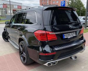 Black Mercedes-Benz GL 350 2014 in Marijampole, with an engine capacity of 2.99 L and mileage of 328 thousand km for 22450 €, photo 16 on AUTOMOTO.COM.LV