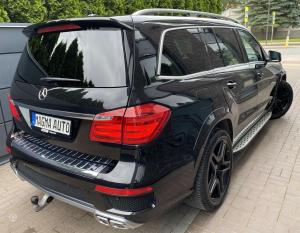 Black Mercedes-Benz GL 350 2014 in Marijampole, with an engine capacity of 2.99 L and mileage of 328 thousand km for 22450 €, photo 18 on AUTOMOTO.COM.LV