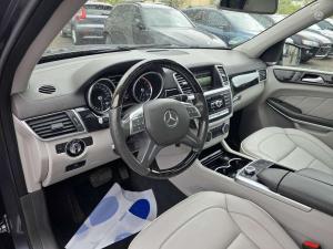 Grey Mercedes-Benz GL 350 2014 in Siauliai, with an engine capacity of 2.99 L and mileage of 295 thousand km for 19200 €, photo 12 on AUTOMOTO.COM.LV