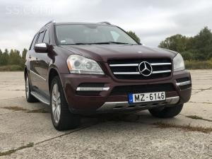 Red Mercedes-Benz GL 350 2010 in Riga, with an engine capacity of 3.00 L and mileage of 290 thousand km for 10999 €, photo  on AUTOMOTO.COM.LV