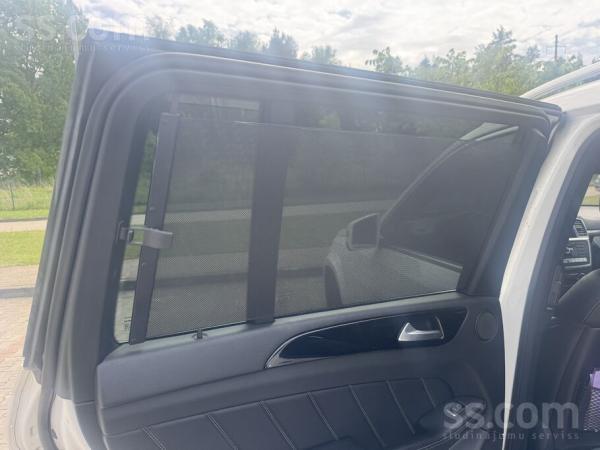 White Mercedes-Benz GL 350 2012 in Riga, with an engine capacity of 3.00 L and mileage of 296 thousand km for 22500 €, photo 9 on AUTOMOTO.COM.LV