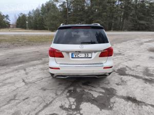 White Mercedes-Benz GL 350 2013 in Riga, with an engine capacity of 3.00 L and mileage of 304 thousand km for 18000 €, photo 6 on AUTOMOTO.COM.LV