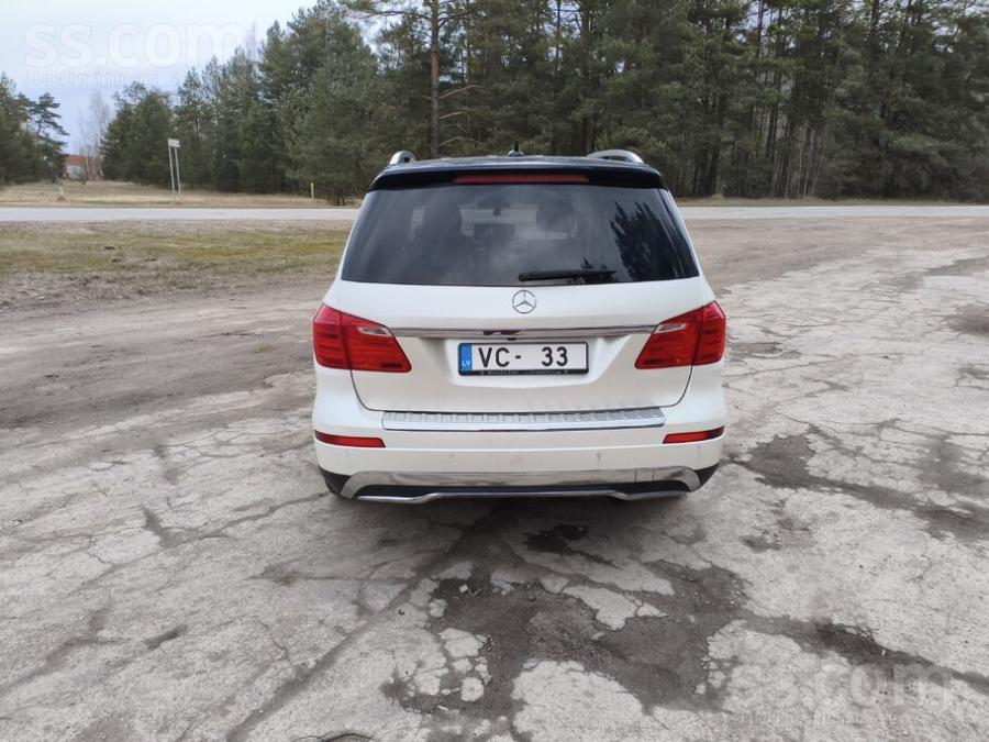 White Mercedes-Benz GL 350 2013 in Riga, with an engine capacity of 3.00 L and mileage of 304 thousand km for 18000 €, photo 6 on AUTOMOTO.COM.LV