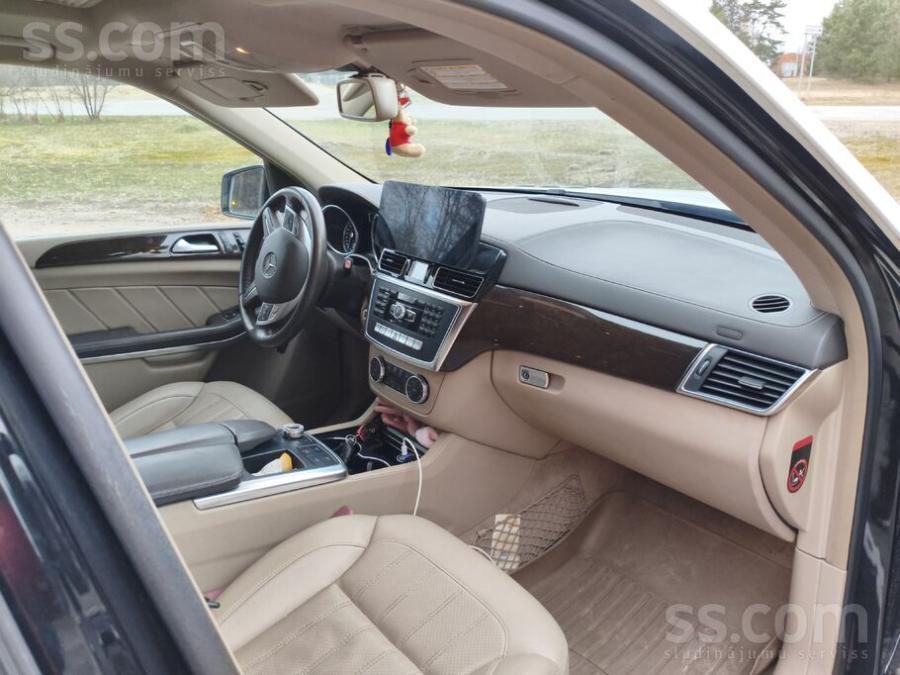 White Mercedes-Benz GL 350 2013 in Riga, with an engine capacity of 3.00 L and mileage of 304 thousand km for 18000 €, photo 8 on AUTOMOTO.COM.LV