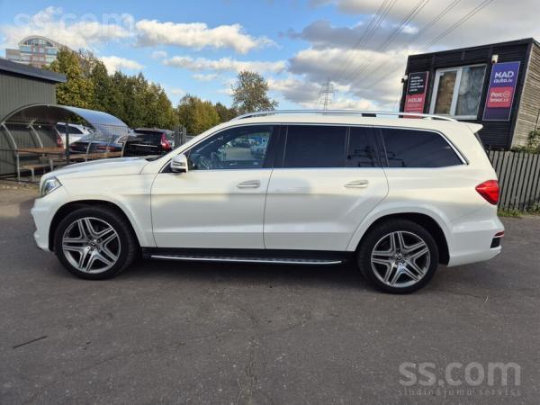 White Mercedes-Benz GL 350 2013 in Riga, with an engine capacity of 3.00 L and mileage of 263 thousand km for 22990 €, photo 10 on AUTOMOTO.COM.LV