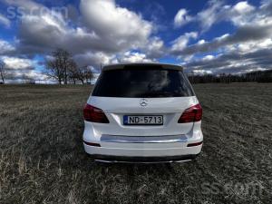 White Mercedes-Benz GL 350 2014 in Riga, with an engine capacity of 3.00 L and mileage of 445 thousand km for 16000 €, photo 3 on AUTOMOTO.COM.LV
