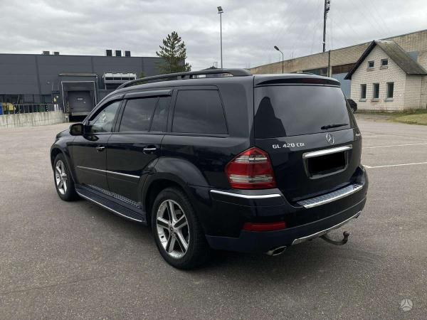 Black Mercedes-Benz gl-420 2007 in Marijampole, with an engine capacity of 4.00 L and mileage of 348 thousand km for 6499 €, photo 6 on AUTOMOTO.COM.LV