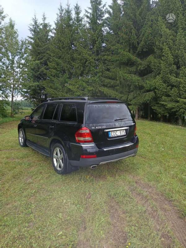 Black Mercedes-Benz gl-420 2007 in Raseiniai, with an engine capacity of 4.00 L and mileage of 244 thousand km for 6700 €, photo 4 on AUTOMOTO.COM.LV