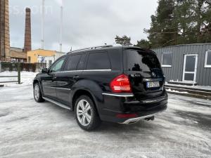 Black Mercedes-Benz GL 450 2011 in Riga, with an engine capacity of 4.70 L and mileage of 295 thousand km for 8700 €, photo  on AUTOMOTO.COM.LV