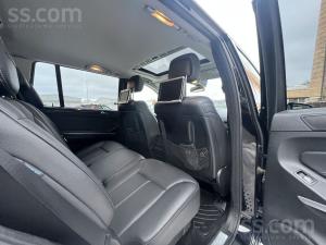Black Mercedes-Benz GL 450 2011 in Riga, with an engine capacity of 4.70 L and mileage of 295 thousand km for 8700 €, photo 17 on AUTOMOTO.COM.LV