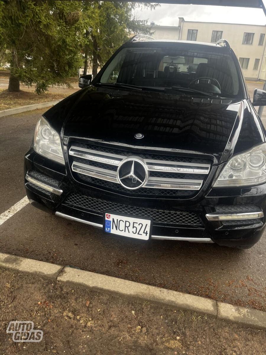 Black Mercedes-Benz GL 450 2011 in Vievis, with an engine capacity of 4.70 L and mileage of 219 thousand km for 12000 €, photo 1 on AUTOMOTO.COM.LV