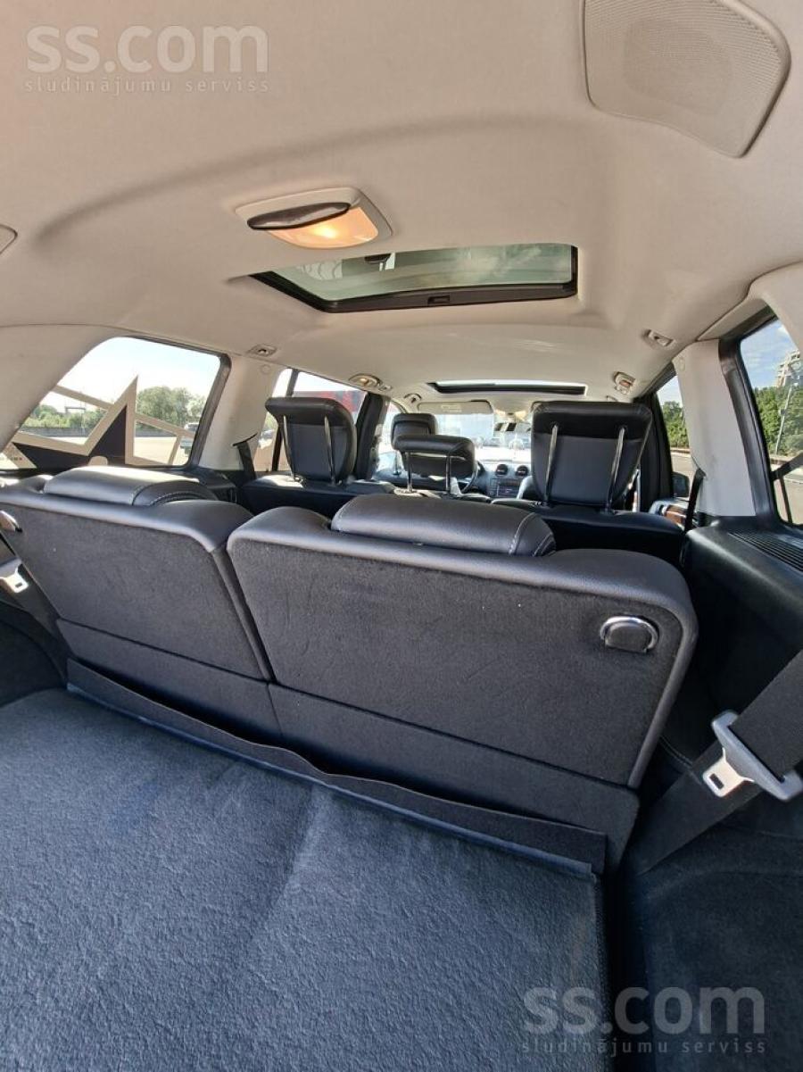 Black Mercedes-Benz GL 450 2011 in Riga, with an engine capacity of 4.70 L and mileage of 212 thousand km for 11000 €, photo 14 on AUTOMOTO.COM.LV