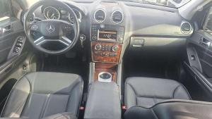 Black Mercedes-Benz GL 450 2011 in Kaunas, with an engine capacity of 4.66 L and mileage of 280 thousand km for 8750 €, photo 14 on AUTOMOTO.COM.LV