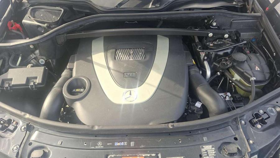 Black Mercedes-Benz GL 450 2011 in Kaunas, with an engine capacity of 4.66 L and mileage of 280 thousand km for 8750 €, photo 23 on AUTOMOTO.COM.LV