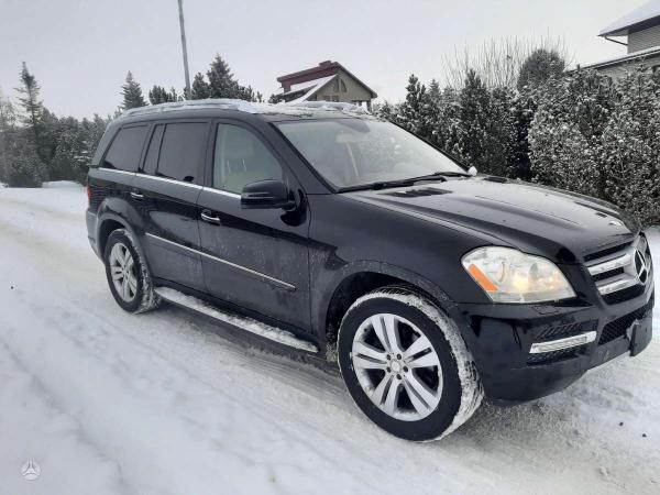 Black Mercedes-Benz GL 450 2012 in Kaunas, with an engine capacity of 4.66 L and mileage of 160 thousand km for 9350 €, photo 6 on AUTOMOTO.COM.LV