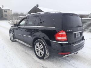 Black Mercedes-Benz GL 450 2012 in Kaunas, with an engine capacity of 4.66 L and mileage of 160 thousand km for 9350 €, photo 9 on AUTOMOTO.COM.LV