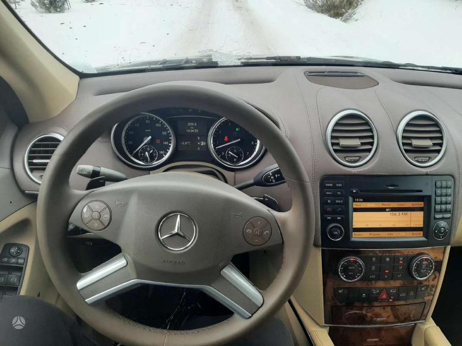 Black Mercedes-Benz GL 450 2012 in Kaunas, with an engine capacity of 4.66 L and mileage of 160 thousand km for 9350 €, photo 14 on AUTOMOTO.COM.LV