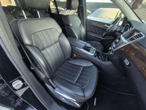 Black Mercedes-Benz GL 450 2013 in Vilnius, with an engine capacity of 4.66 L and mileage of 157 thousand km for 12050 €, photo 12 on AUTOMOTO.COM.LV