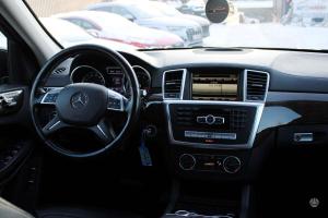 Black Mercedes-Benz GL 450 2013 in Vilnius, with an engine capacity of 4.66 L and mileage of 157 thousand km for 12050 €, photo 15 on AUTOMOTO.COM.LV