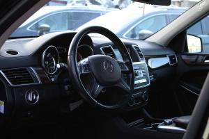 Black Mercedes-Benz GL 450 2013 in Vilnius, with an engine capacity of 4.66 L and mileage of 157 thousand km for 12050 €, photo 16 on AUTOMOTO.COM.LV