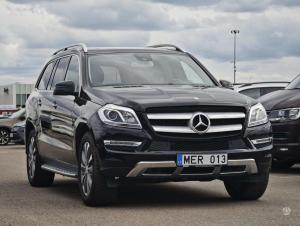 Black Mercedes-Benz GL 450 2013 in Vilnius, with an engine capacity of 4.66 L and mileage of 172 thousand km for 14200 €, photo  on AUTOMOTO.COM.LV
