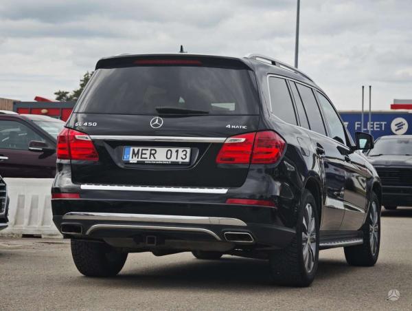 Black Mercedes-Benz GL 450 2013 in Vilnius, with an engine capacity of 4.66 L and mileage of 172 thousand km for 14200 €, photo 8 on AUTOMOTO.COM.LV