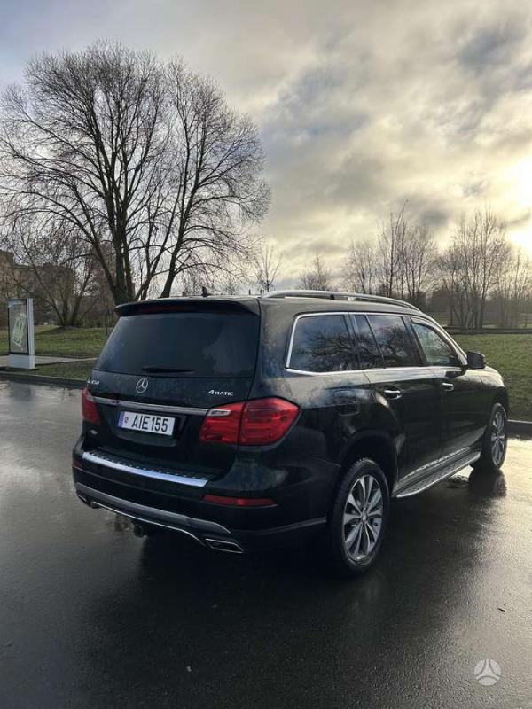 Black Mercedes-Benz GL 450 2015 in Panevezys, with an engine capacity of 3.00 L and mileage of 185 thousand km for 15000 €, photo 6 on AUTOMOTO.COM.LV