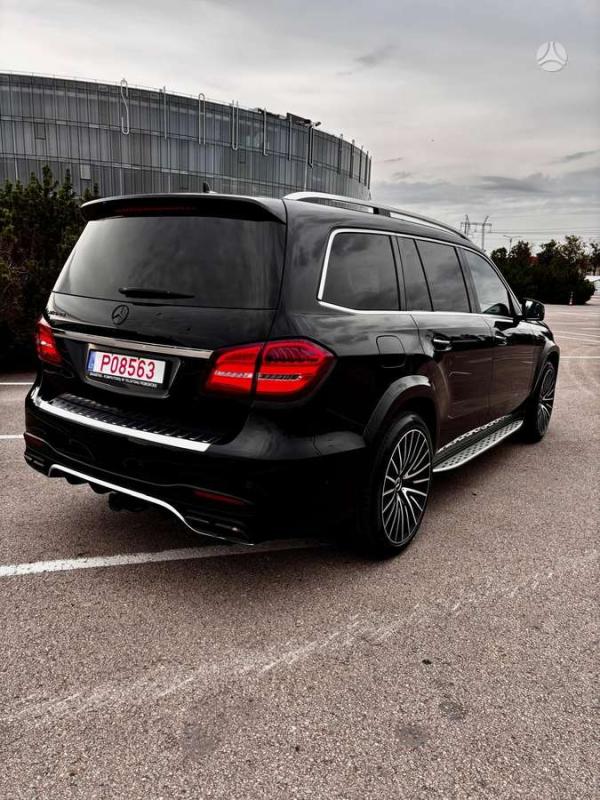 Black Mercedes-Benz GL 450 2015 in Siauliai, with an engine capacity of 3.00 L and mileage of 138 thousand km for 21950 €, photo 7 on AUTOMOTO.COM.LV