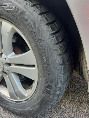 Grey Mercedes-Benz GL 450 2008 in Vilnius, with an engine capacity of 4.70 L and mileage of 221 thousand km for 4200 €, photo 9 on AUTOMOTO.COM.LV
