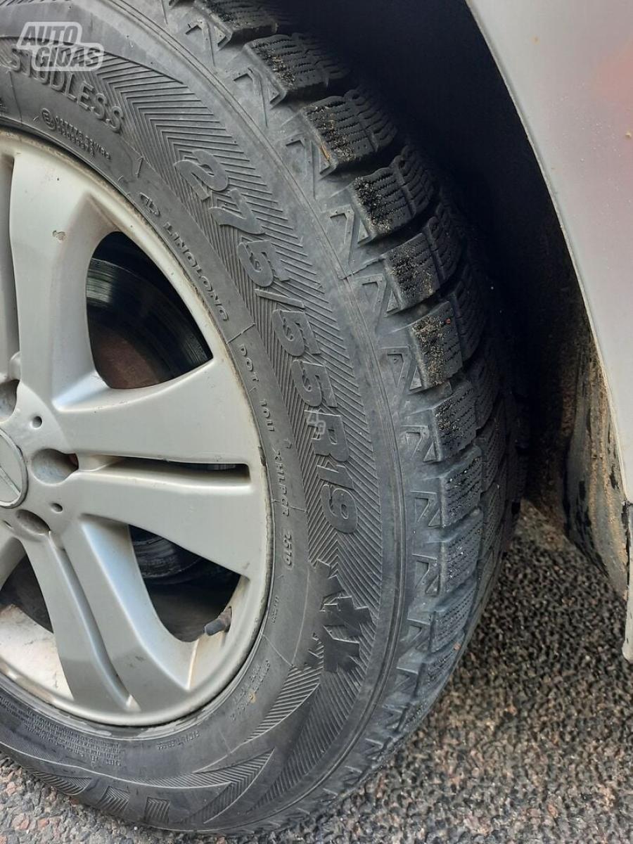 Grey Mercedes-Benz GL 450 2008 in Vilnius, with an engine capacity of 4.70 L and mileage of 221 thousand km for 4200 €, photo 9 on AUTOMOTO.COM.LV